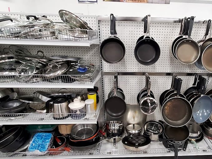 Pots and pans hang like kitchen trophies, ready to cook meals that cost less than takeout.