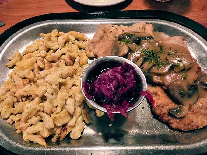 Golden schnitzel meets mushroom sauce in a plate composition that would make any German grandmother nod with stern approval.