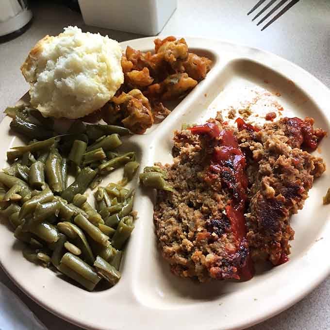 Meatloaf, mashed potatoes, green beans, and mac and cheese: proof that simple done right beats fancy every time.