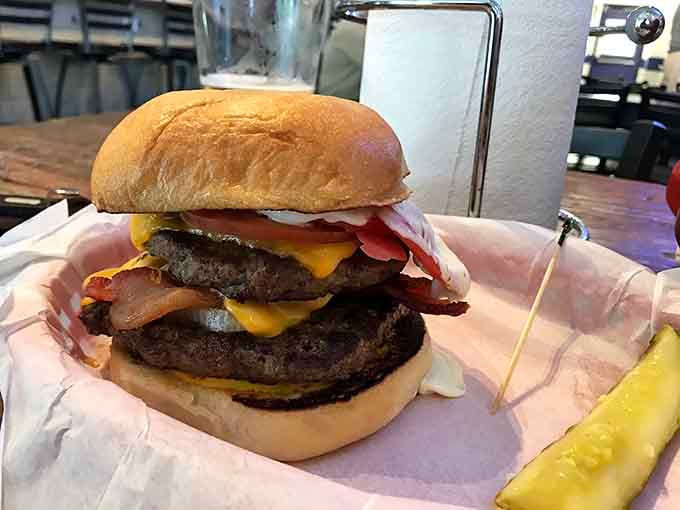 Two patties, melted cheese, and bacon stacked high, this double-decker beauty means serious business for your taste buds.