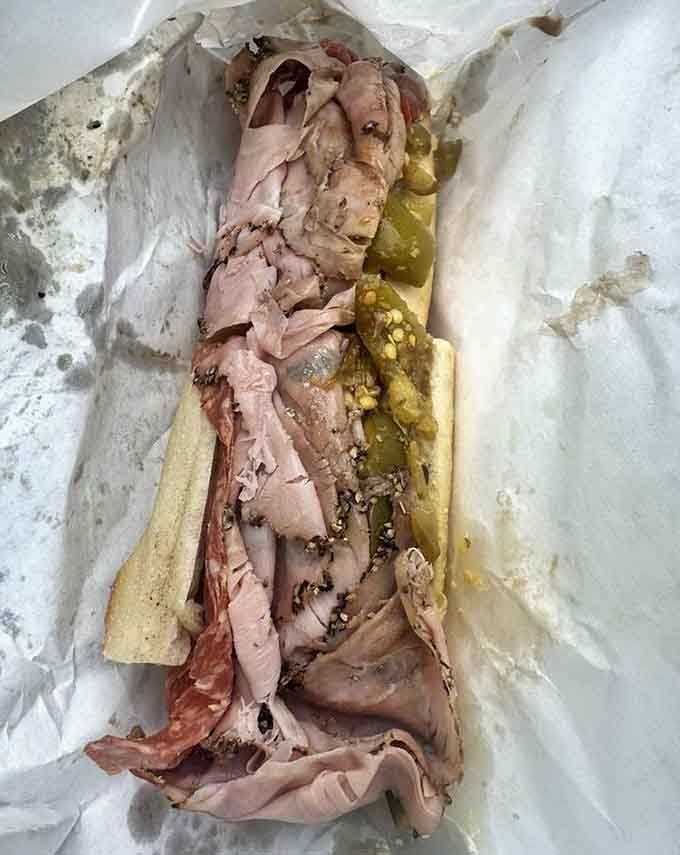 This is what happiness looks like when it's wrapped in paper and stuffed with fresh-sliced perfection.