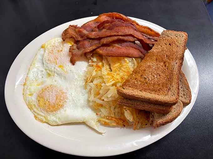 Perfectly crispy bacon, golden hash browns, and eggs cooked just right—breakfast doesn't need to be complicated.