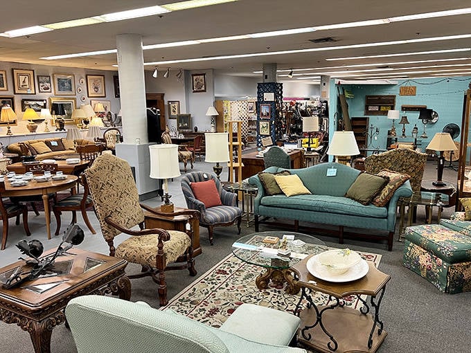 Living room vignettes arranged like movie sets waiting for their stars. That teal sofa has definitely heard some family secrets.