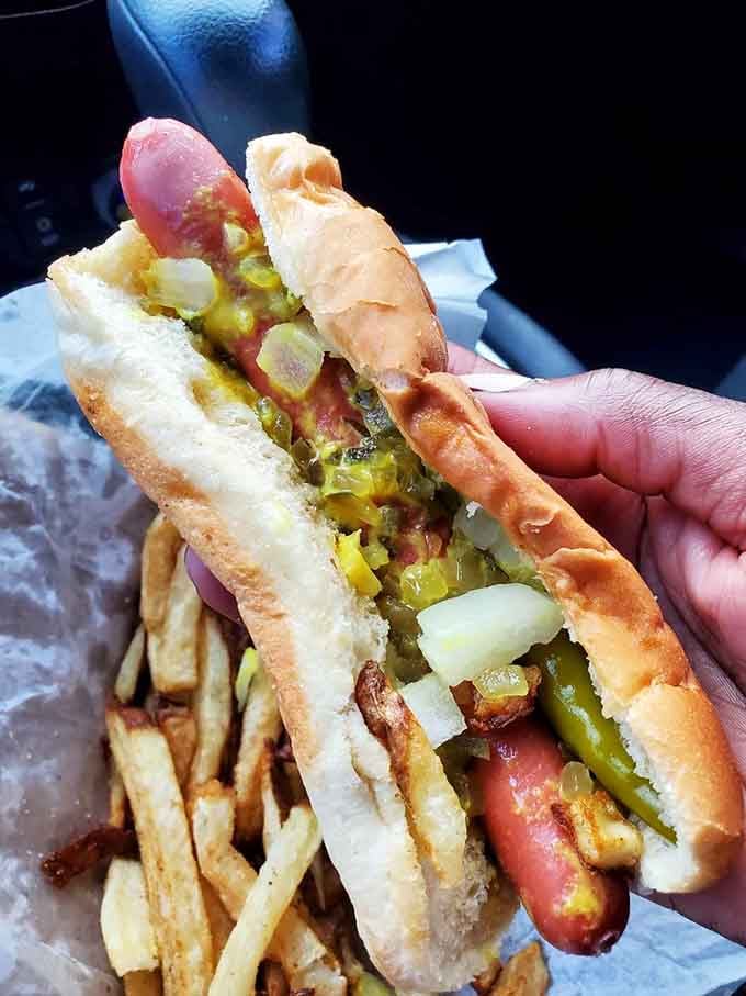 Behold the depression dog in all its messy, glorious, fries-on-top magnificence that defies all hot dog conventions.