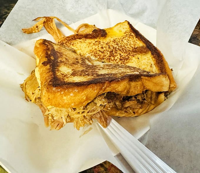 The legendary grilled cheese with pulled pork &ndash; where bread achieves golden perfection and cheese performs miracles. This sandwich doesn't just satisfy hunger; it creates happiness.