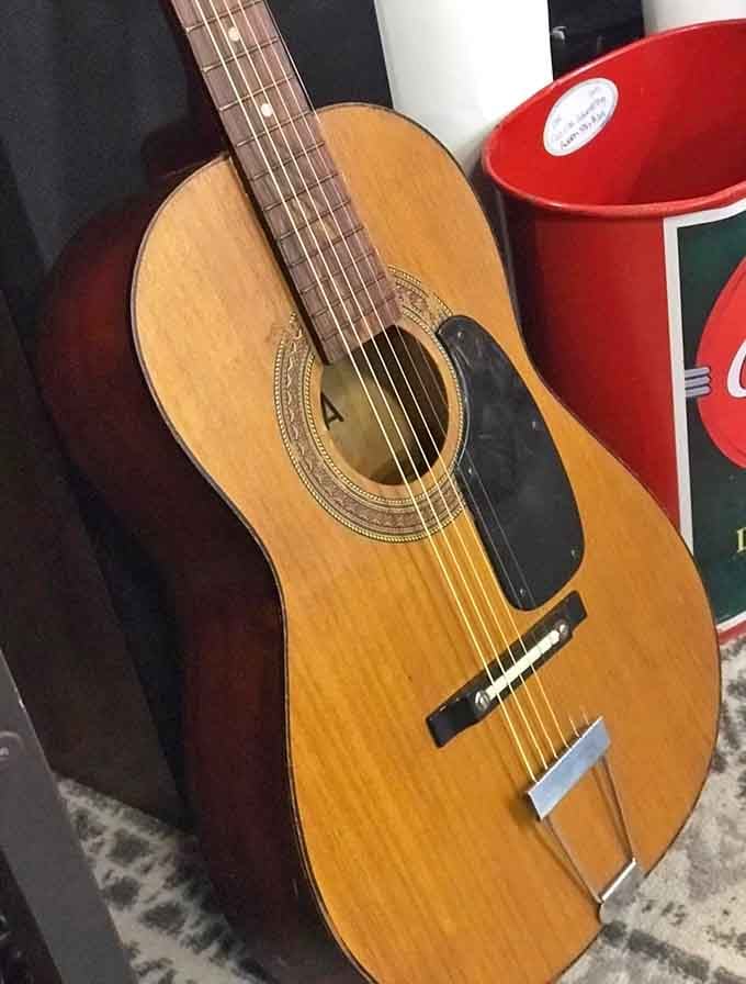 This vintage acoustic guitar isn't just an instrument&mdash;it's a storyteller waiting for new fingers to strum its well-worn strings.