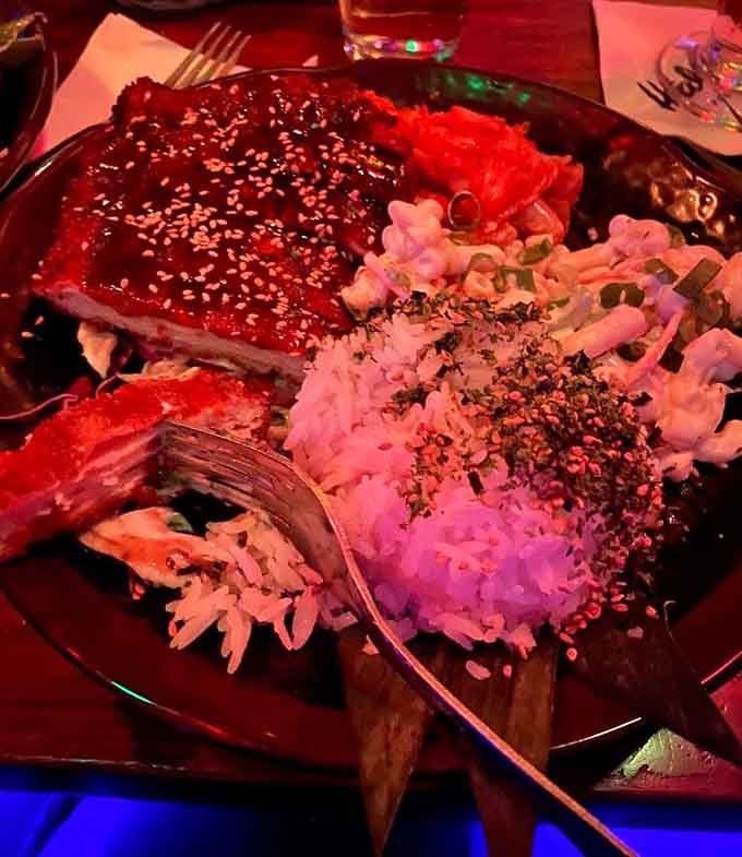 Glazed short ribs that shine like treasure, served with sides that complete this island feast perfectly.