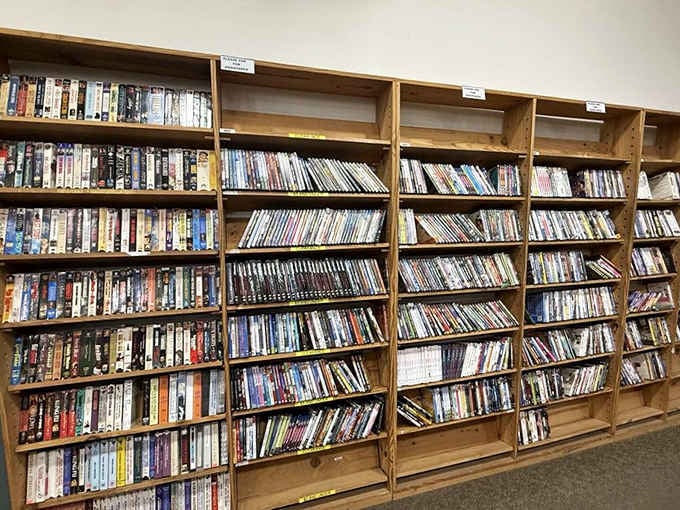 VHS tapes and DVDs line the walls, a nostalgic reminder that physical media still has devoted fans.