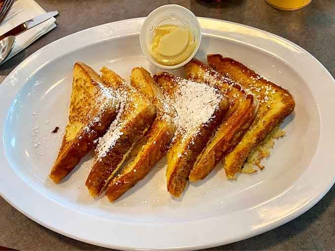 French toast dusted with powdered sugar like fresh snow, because sometimes simple perfection needs no explanation.