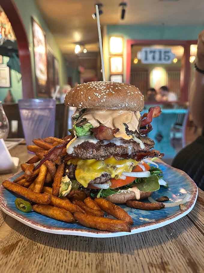 The Balrog Burger towers like Mount Doom, except this one you actually want to conquer with your mouth.