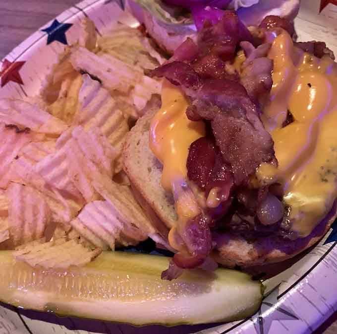 This bacon cheeseburger arrives looking like it means business, piled high with everything your appetite has been dreaming about.