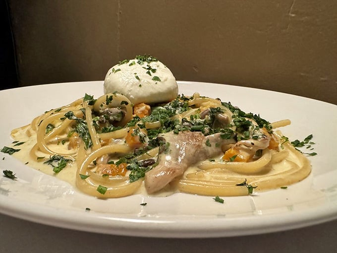 Bucatini twirled to perfection with that crown of burrata sitting pretty like it owns the place, because honestly, it does.