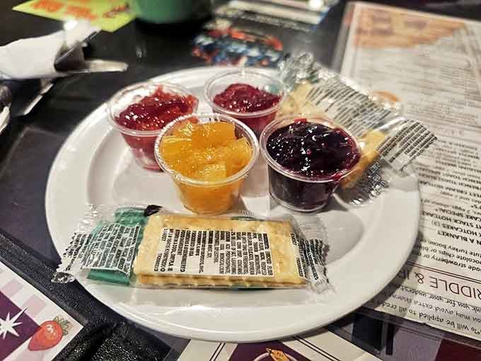 The holy quartet of homemade jams&mdash;nature's candy in little plastic cups, transforming ordinary toast into something worth crossing town for.