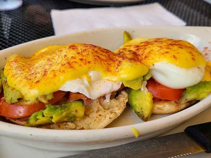Two perfectly poached eggs drowning in hollandaise&mdash;this is what breakfast dreams are made of, people.