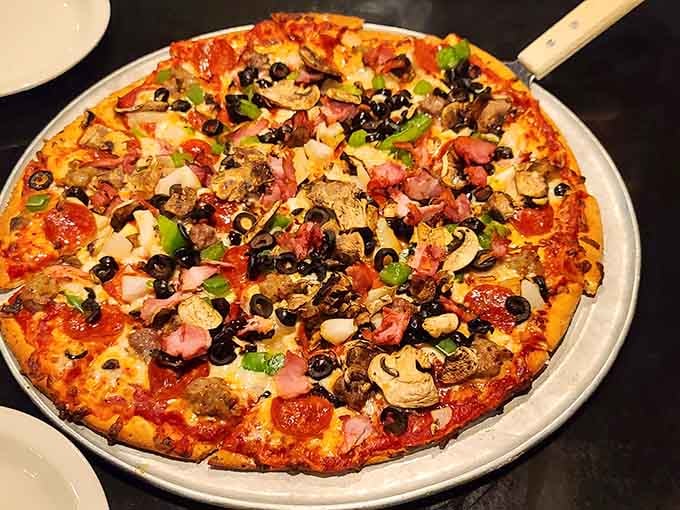 When someone orders "everything" on their pizza, this is what culinary ambition looks like in its most glorious form.