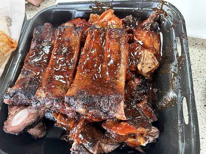 Ribs so tender they're practically waving goodbye to the bone before you even pick them up with your hands.