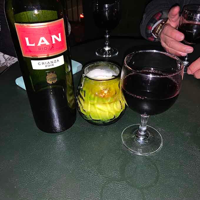 Red wine by candlelight in Texas's oldest bar beats scrolling through your phone any night of the week.