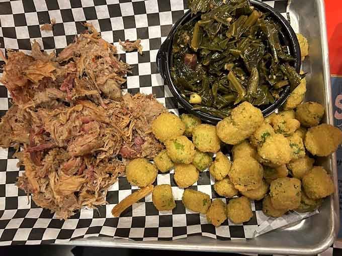 Pulled pork, collard greens, and hushpuppies on a checkered tray: Southern comfort food's greatest hits album.