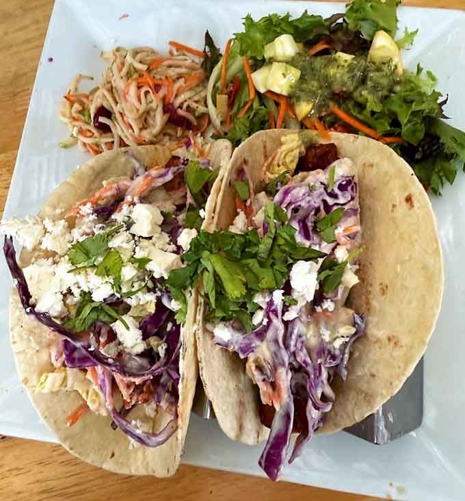 Fish tacos topped with feta and cilantro, because sometimes the best flavor combinations break all the traditional rules.