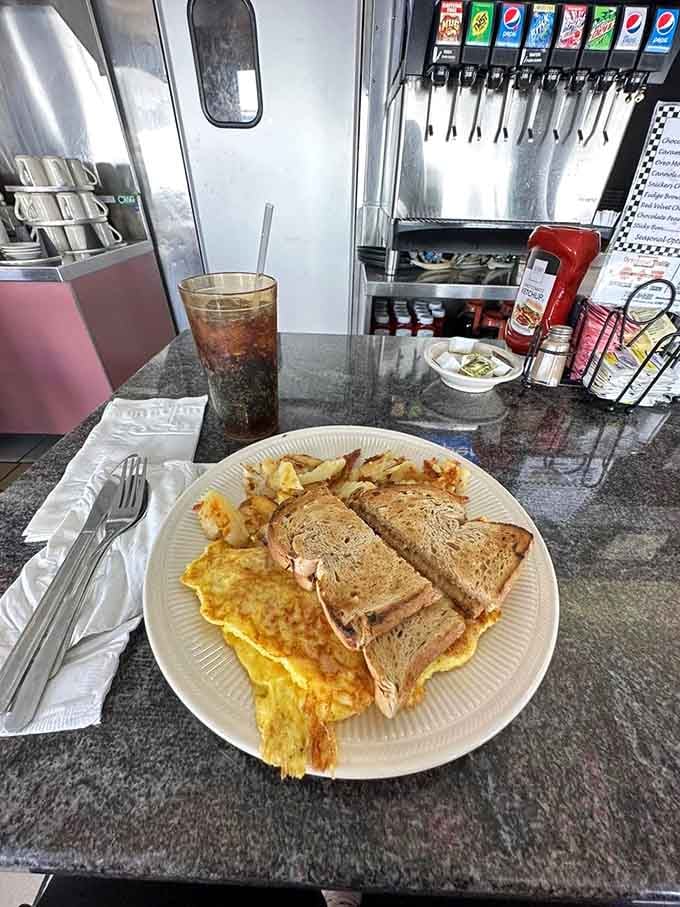 Golden eggs, perfectly seasoned home fries, and toast that actually tastes like bread, not cardboard with butter.