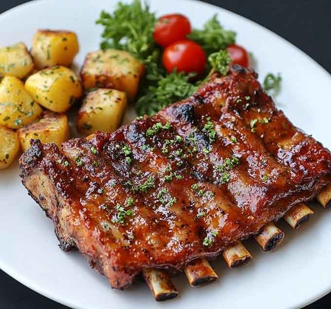 These ribs showcase that perfect bark and tender meat that makes waiting in line completely worthwhile.