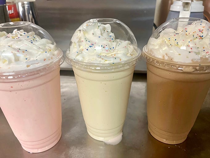Three towers of whipped cream-topped glory that require strategic planning and possibly a designated driver for your sugar high.