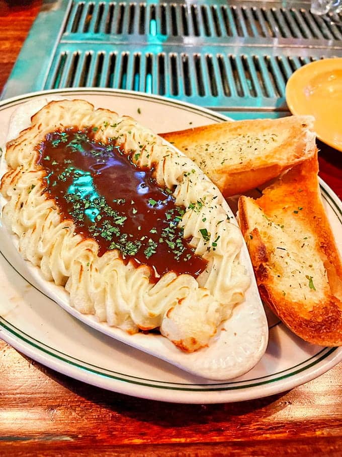 Shepherd's pie done right: layers of savory comfort topped with golden mashed potatoes that'll make you forget your diet exists.