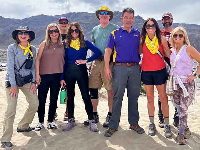 Happy explorers pause for the mandatory group shot, because if you didn't photograph Death Valley, did you really go?