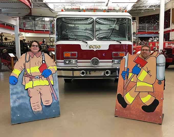 Nothing says "family fun" quite like sticking your head through a cardboard firefighter for posterity's sake.