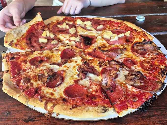 When your pizza looks like a topographical map of deliciousness, you know you've ordered right.