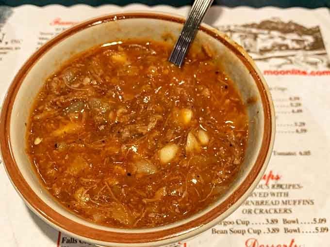 One bowl of burgoo contains more Kentucky soul than a thousand bourbon distillery tours combined.