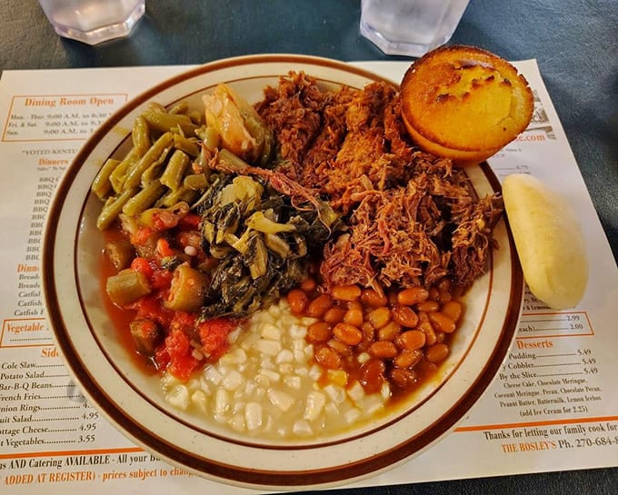 Behold the buffet plate of champions: mutton, beans, greens, and cornbread working together in perfect harmony.