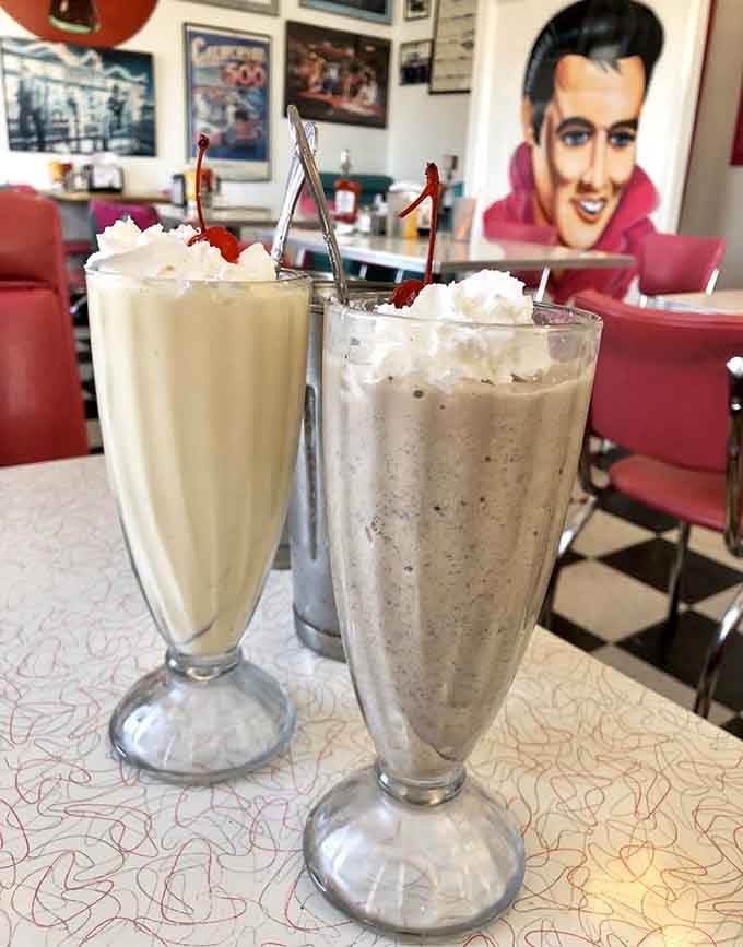 These towering milkshakes come topped with whipped cream and a cherry, because restraint was never part of the plan.