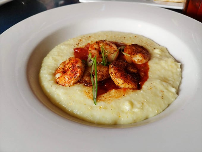 Perfectly blackened shrimp nestled on creamy grits prove that some combinations were simply meant to be together forever.