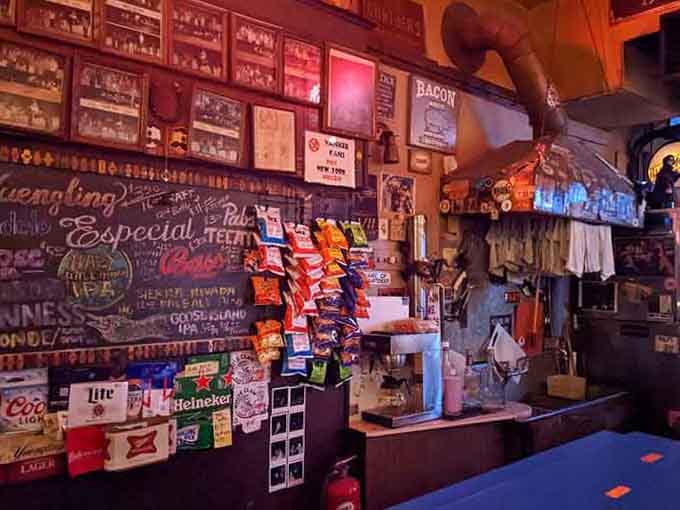 Behind the bar, decades of beer history create a museum you can actually drink in, which is the best kind.