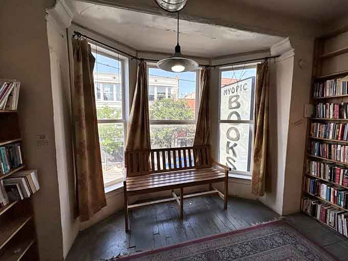 A quiet reading nook with natural light streaming through those windows beats any fancy coffee shop corner.