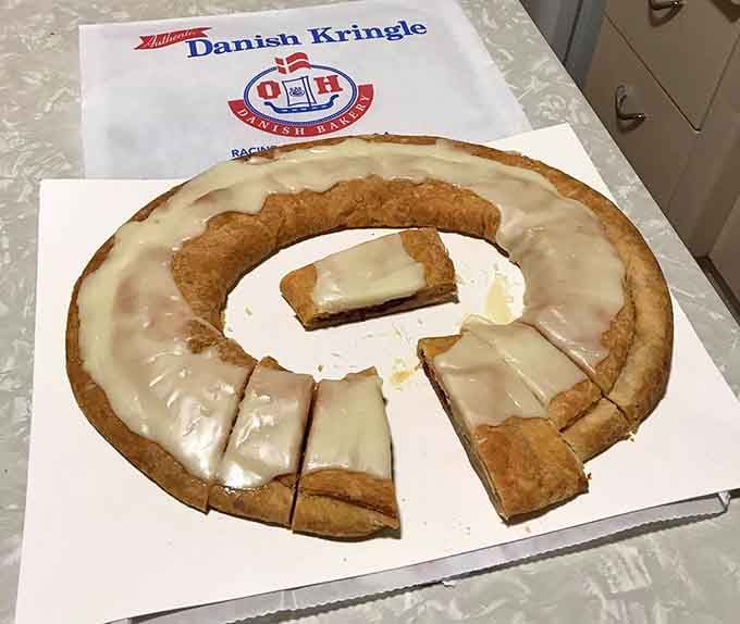 Behold the kringle in its natural habitat: sliced, glazed, and ready to change your life forever.