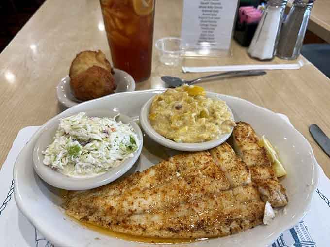 Broiled flounder arrives golden and seasoned, proving healthy choices can still make your taste buds sing beautifully.