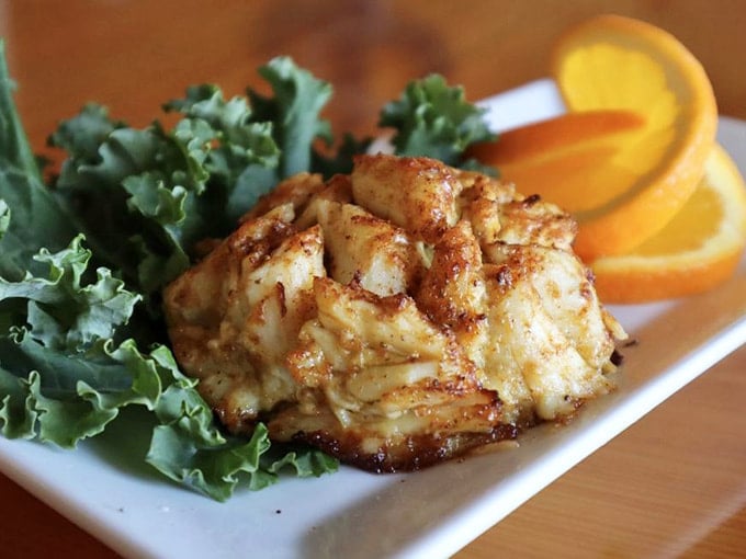 Behold the jumbo lump crab cake in all its golden glory, more crab than cake, exactly as nature intended.