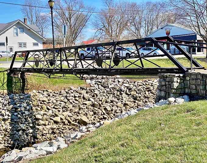 This vintage pedestrian bridge proves that even the infrastructure here has more Old World character than most towns.