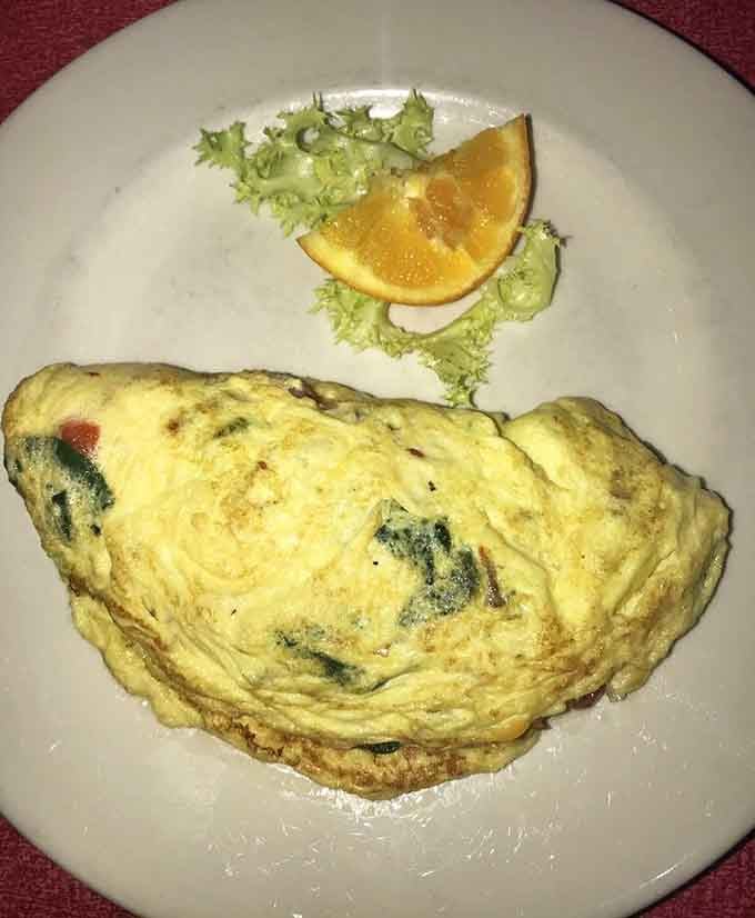 This fluffy omelet doesn't just sit on the plate&mdash;it lounges there confidently, knowing it's about to become the highlight of your day.