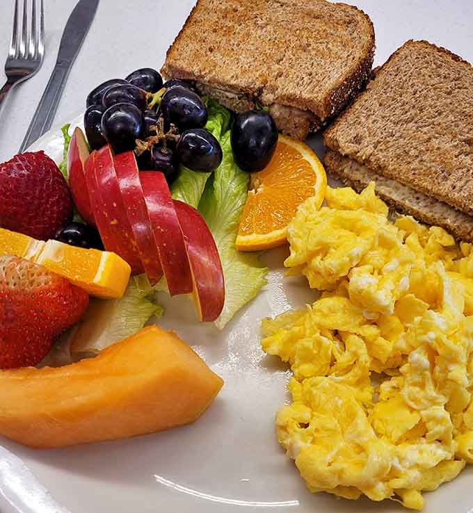 Scrambled eggs, fresh fruit, and perfectly toasted bread prove that simple done right beats fancy done wrong every single time.