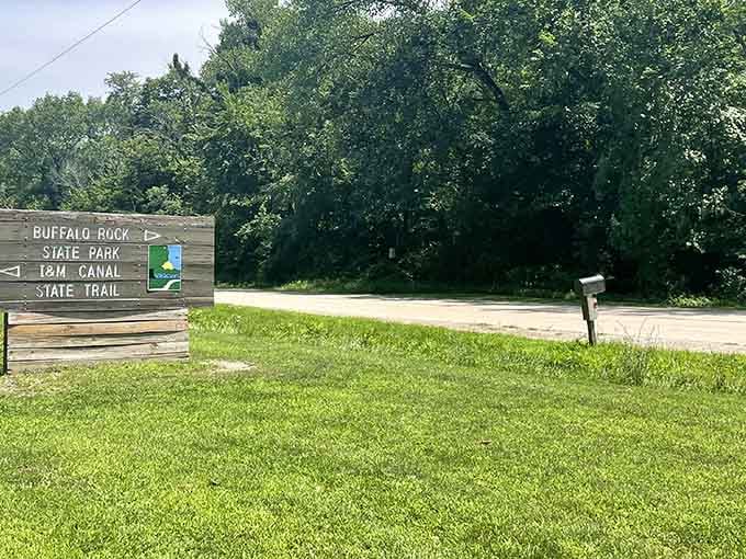 The trailhead to Buffalo Rock State Park beckons hikers toward geological wonders and those famous earthwork sculptures.