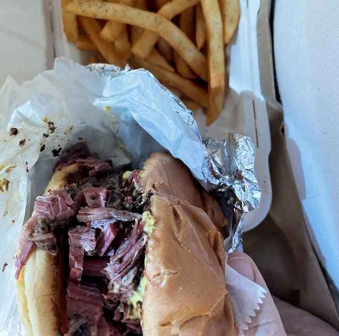 Behold the star of our show&mdash;pastrami piled high with peppery bark and tender pink interior. This sandwich doesn't need fancy accessories, just fries and your undivided attention.