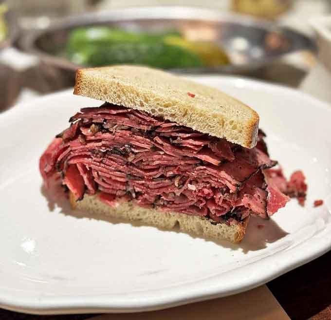 Behold the pastrami mountain! Thinly sliced, perfectly spiced, and stacked with such ambition it makes skyscrapers jealous.