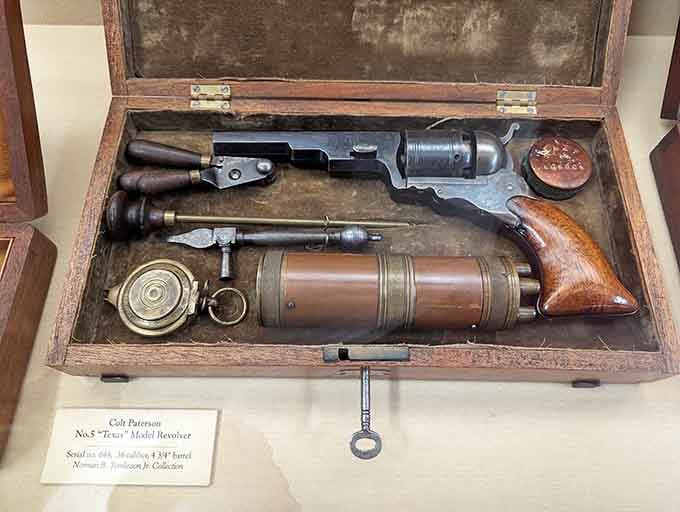 This Colt revolver in its wooden case looks like something from a Western, minus the tumbleweeds.