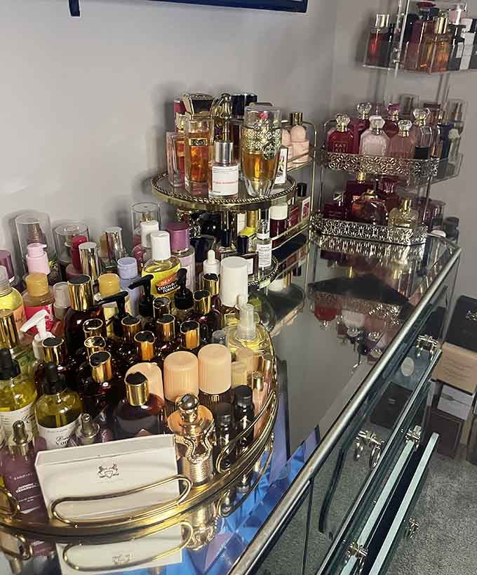 Fragrance heaven awaits! This meticulously arranged perfume collection would make Coco Chanel herself stop for a spritz or three.