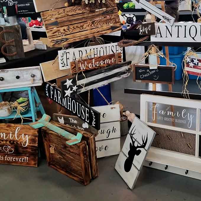 Farmhouse signs promising love and laughter, because apparently every wall needs motivational wood these days.