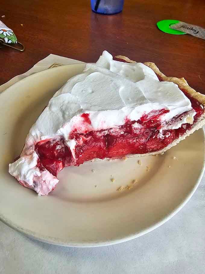 This slice of cherry pie isn't just dessert&mdash;it's Michigan summer captured between two perfectly flaky crusts, topped with a cloud of whipped cream.