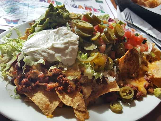 Nachos piled high enough to require air traffic control, because sometimes more really is more in the best possible way.